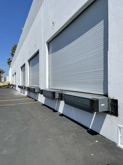 Guide to Understanding Dock-High vs. Grade Level Doors